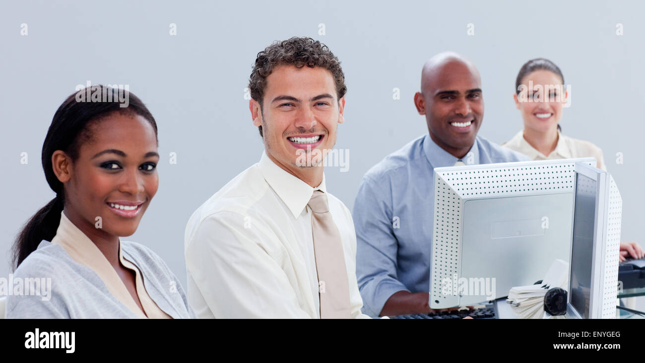 Serious business group working hard in the office Stock Photo - Alamy