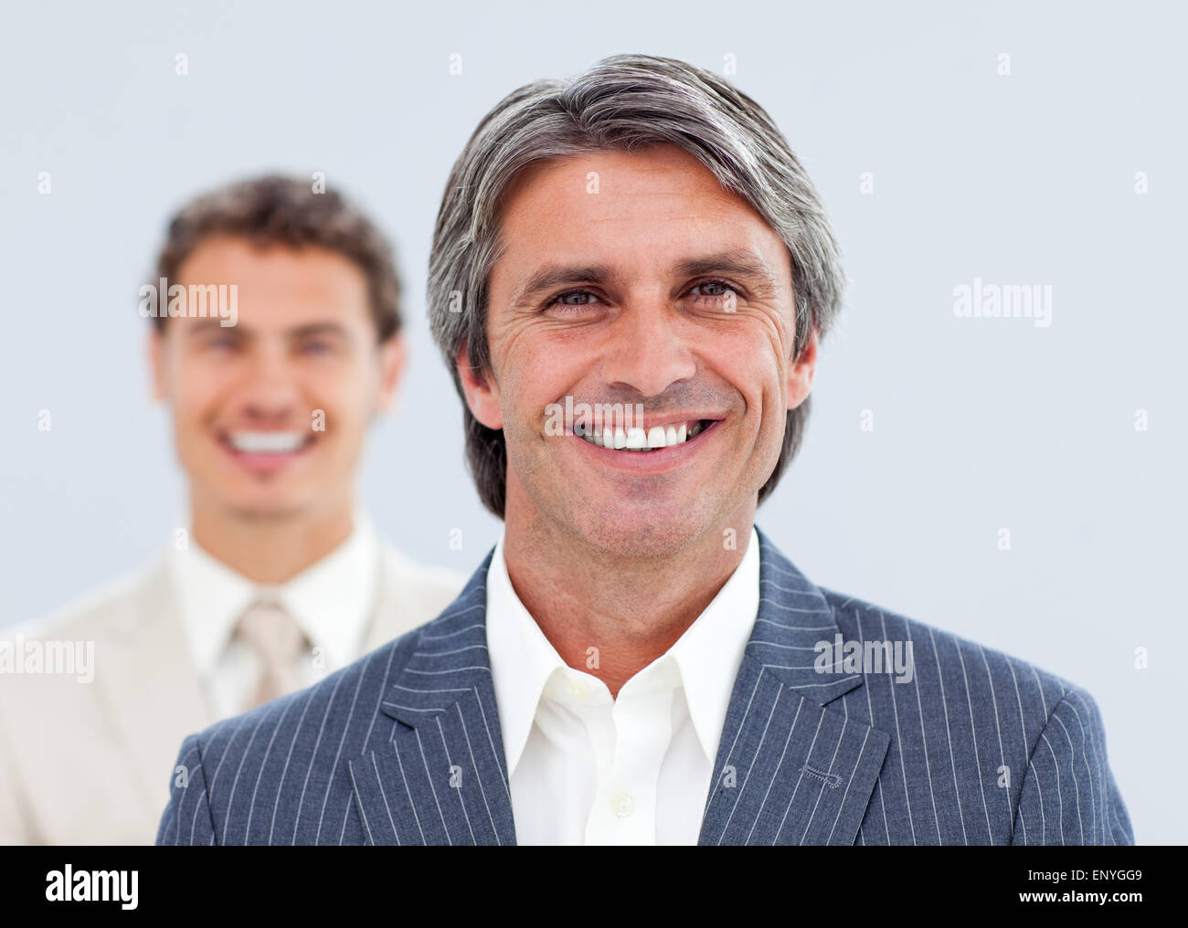 Portrait of two smiling businessmen Stock Photo - Alamy