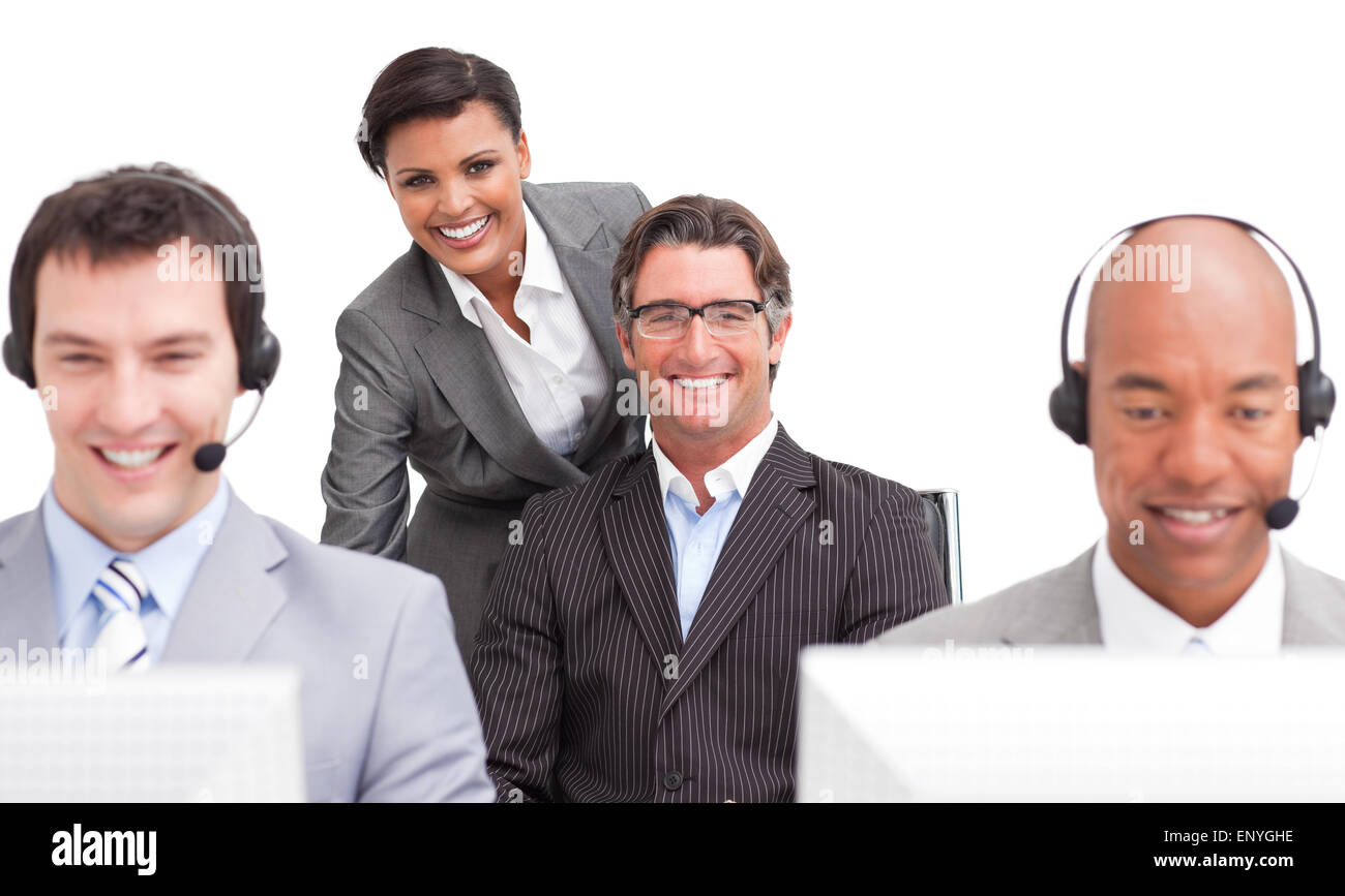 Ambitious customer agent team working in the office against a white ...