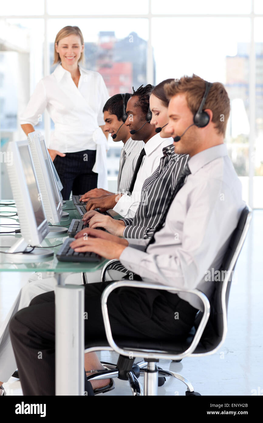 Cute manager leading her representative team Stock Photo - Alamy