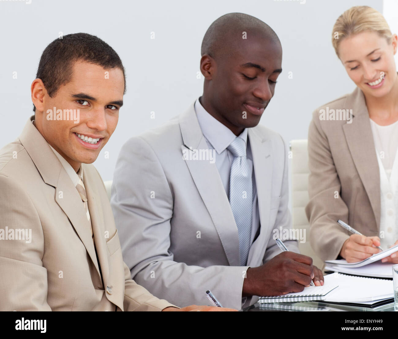 Business People Smiling in a meeting Stock Photo - Alamy