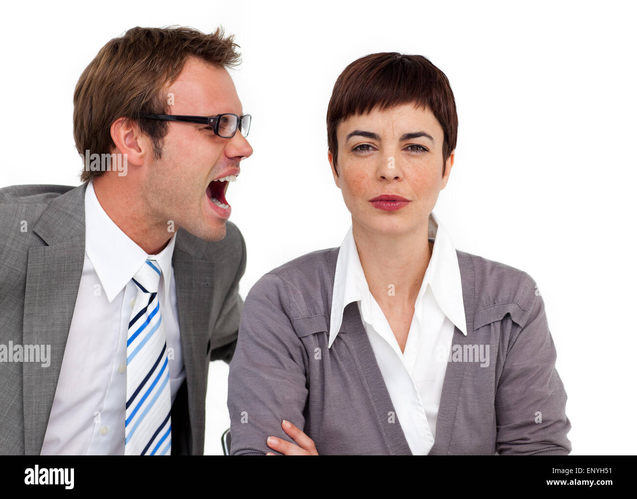 Angry businessman shouting into his colleague's ear Stock Photo - Alamy