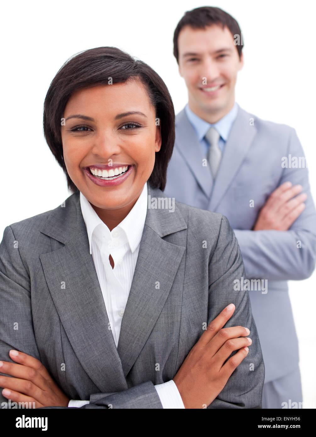 Beautiful businesswoman posing in front of her colleague Stock Photo ...