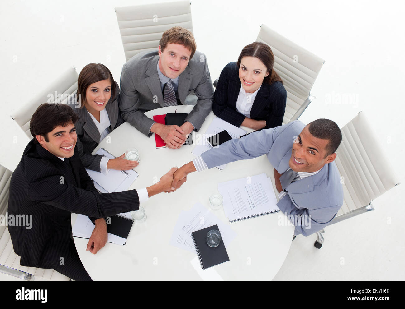 Internatonal Business people closing a deal Stock Photo - Alamy