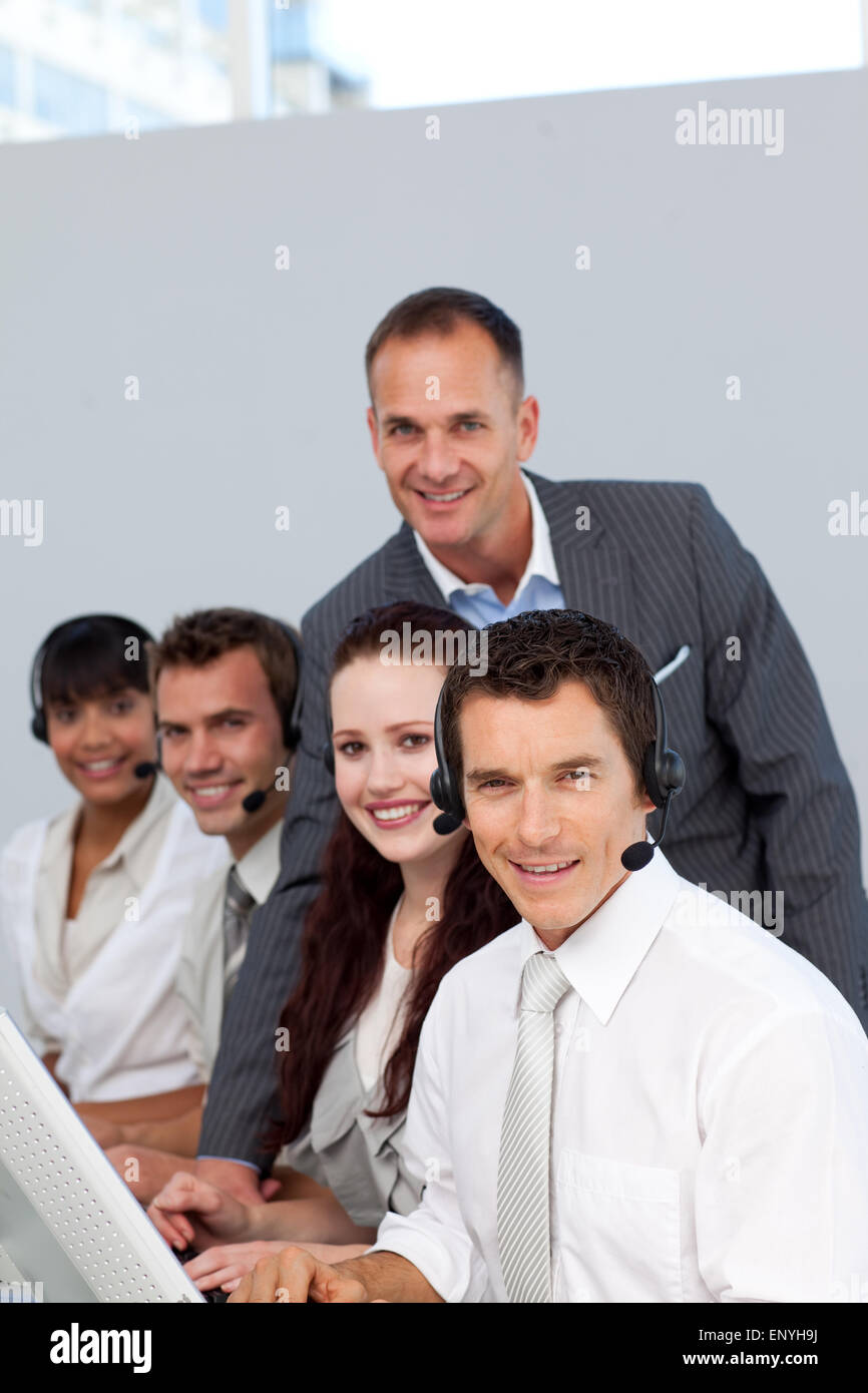 Manager and his team working in a call center Stock Photo - Alamy