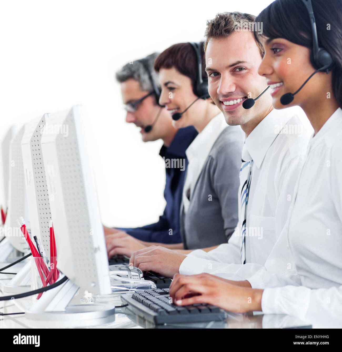 Confident customer service representatives with headset on Stock Photo ...