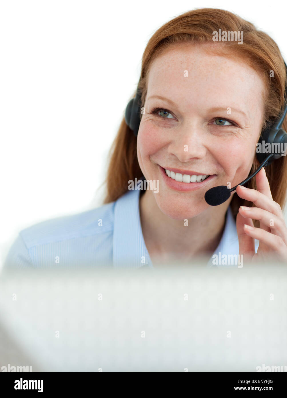Young customer service agent with headset on Stock Photo - Alamy