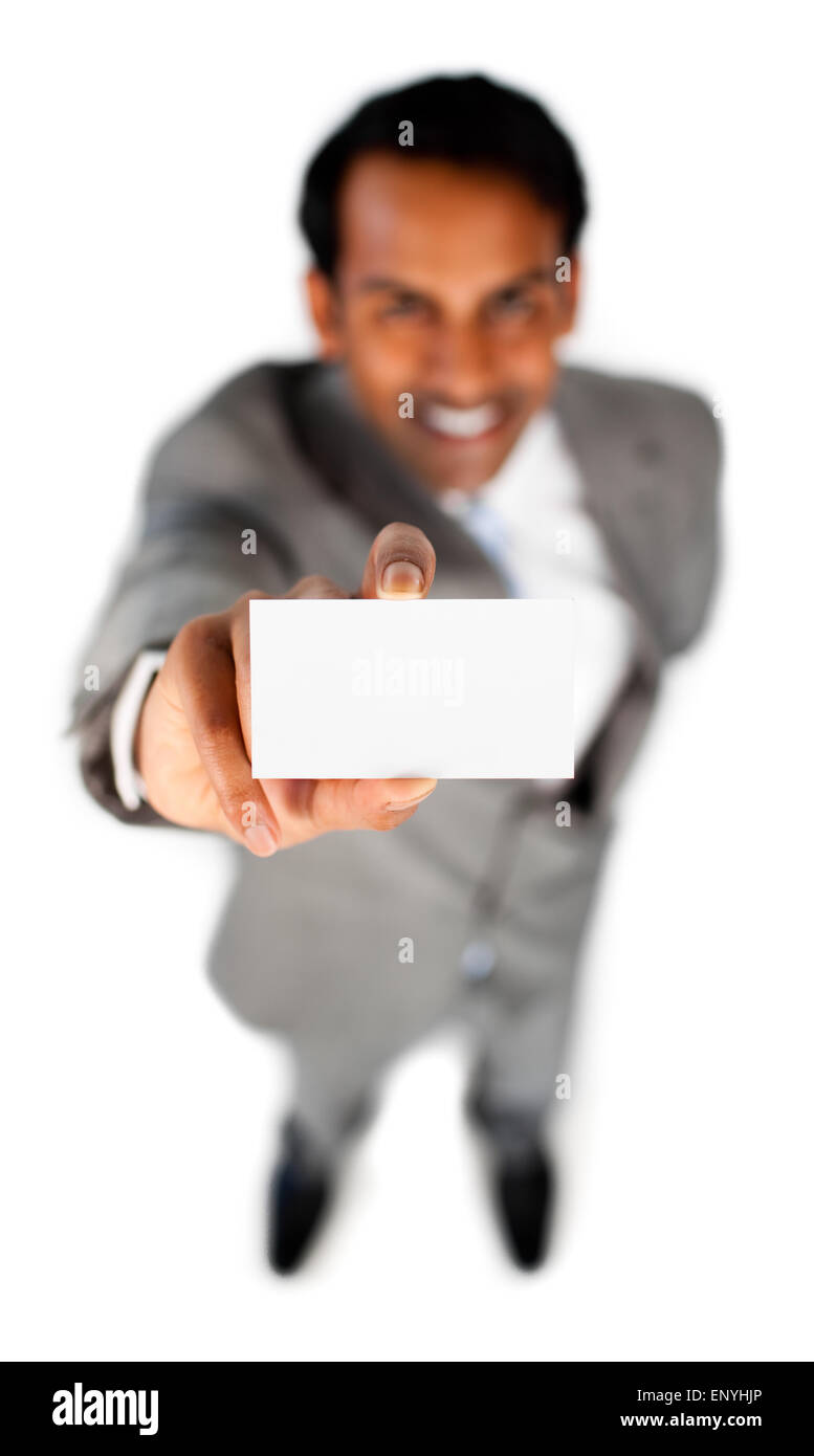 Smiling ethnic businessman holding a white card Stock Photo - Alamy