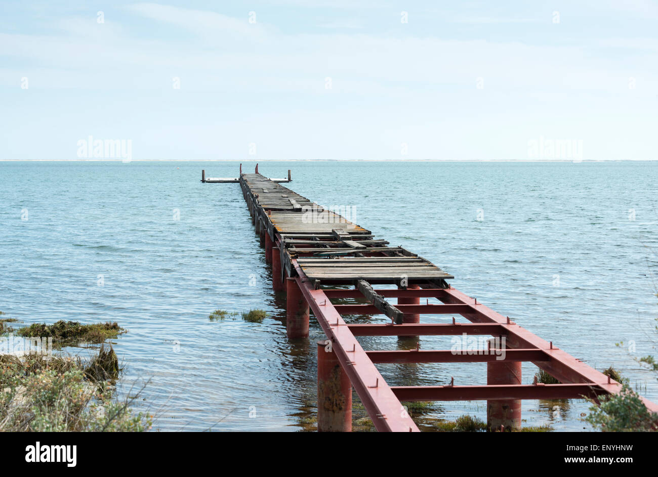 old rusted urban quay with broken wooden plank Stock Photo - Alamy