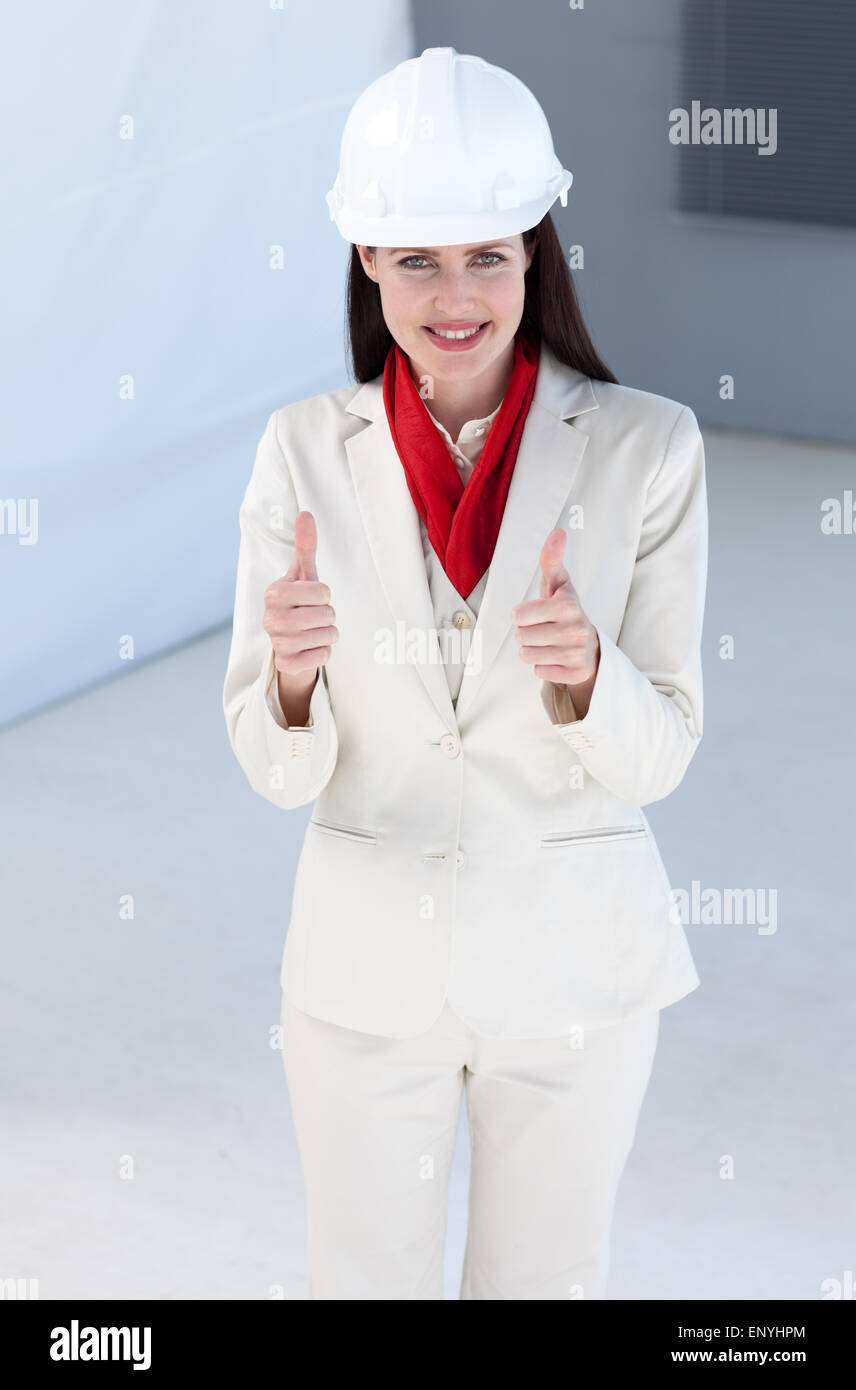 Beautiful female architect wearing a hard hat Stock Photo - Alamy