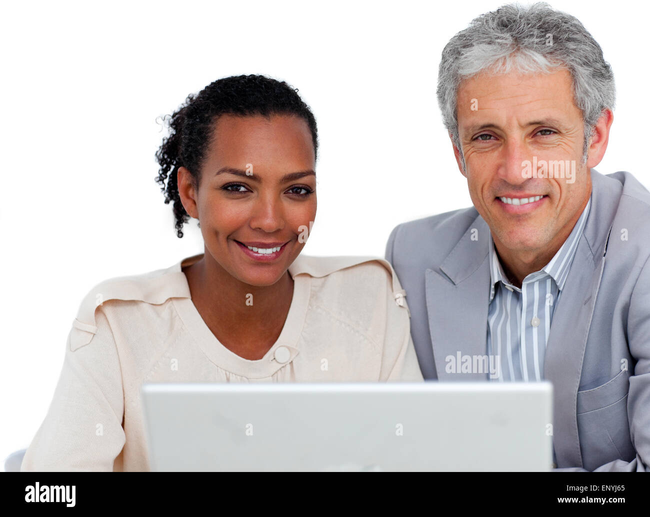 Diverse business people working at a computer in an office Stock Photo ...