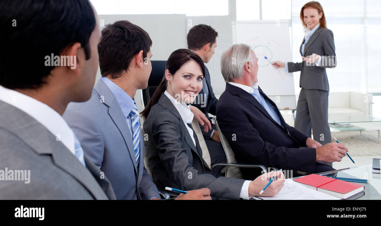 Business team looking sales figures hi-res stock photography and images ...