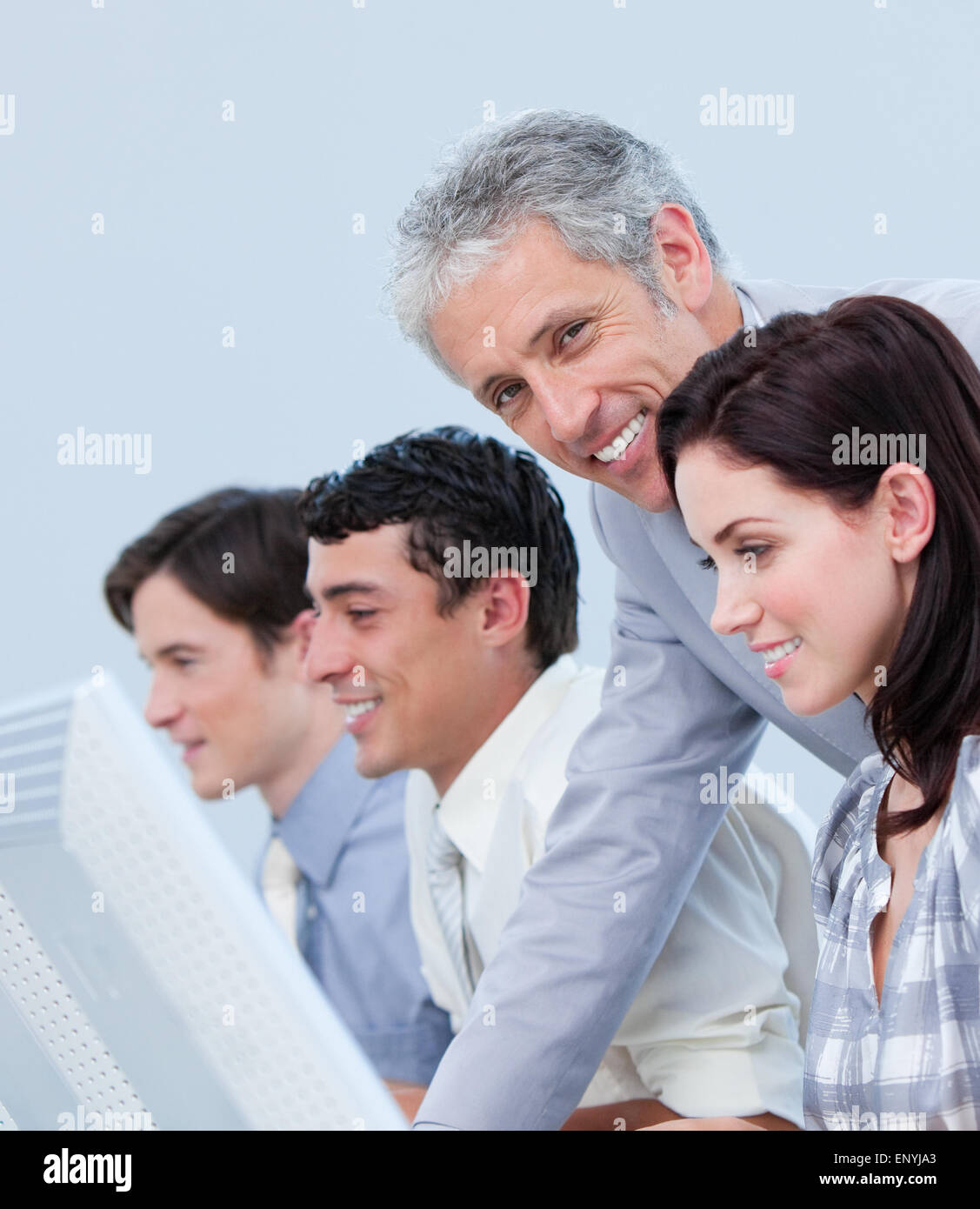 Assertive mature manager checking his employee's work Stock Photo - Alamy