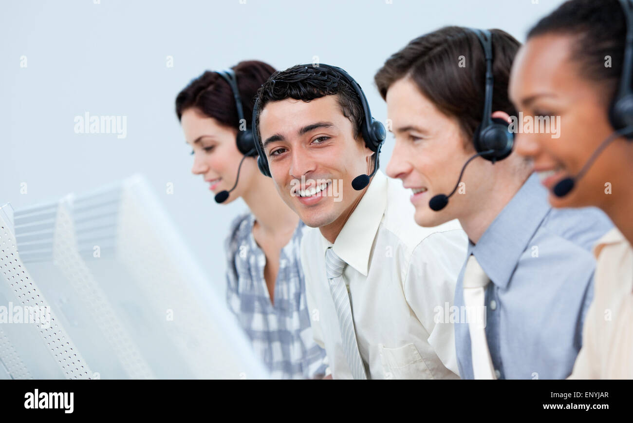 Young customer service representatives in a call center Stock Photo - Alamy