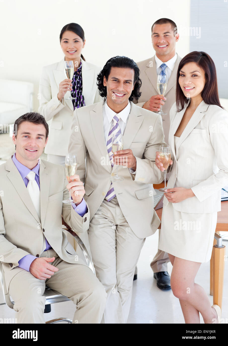 Male female employees drinking wine hi-res stock photography and images ...
