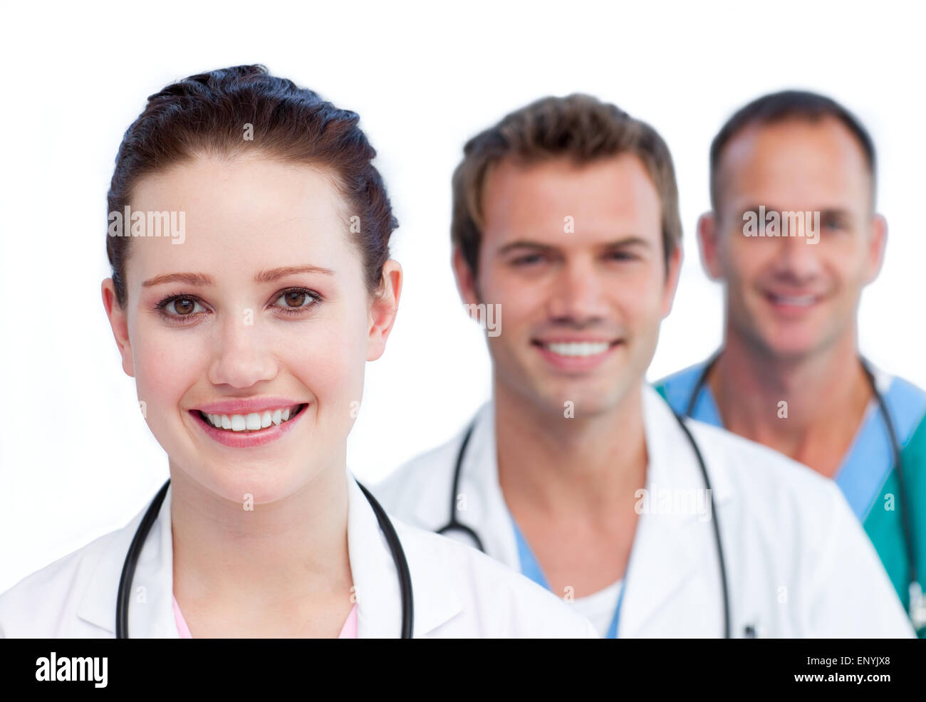 Presentation of a smiling medical team against a white background Stock ...
