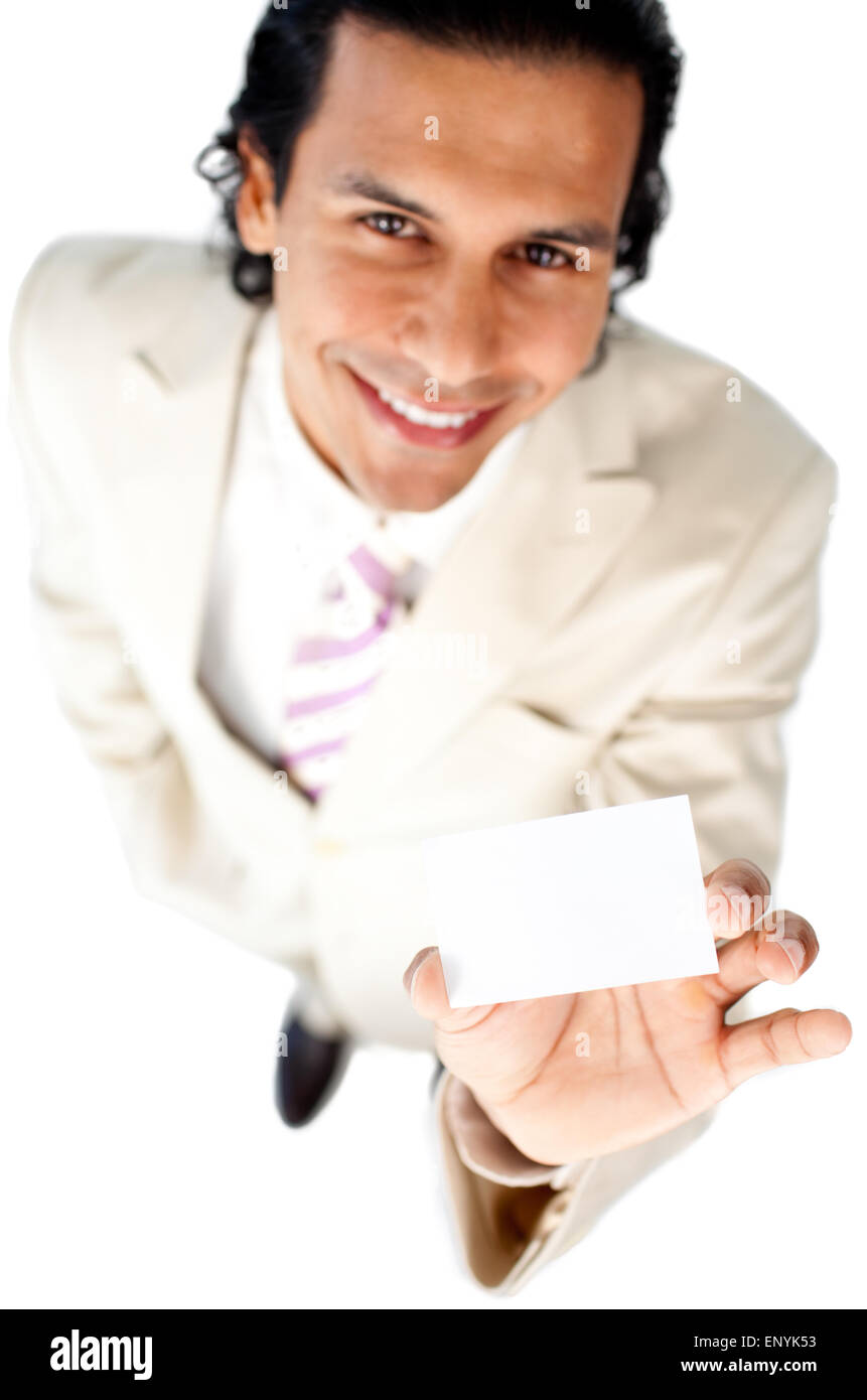 Charming businessman holding a white card against a white background ...