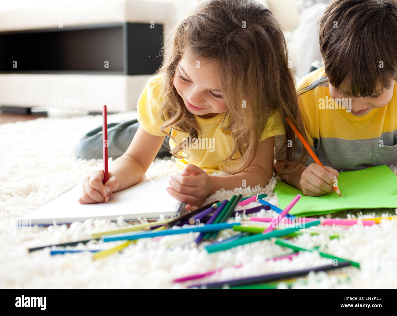 Close-up of children drawing lying on the floor Stock Photo - Alamy