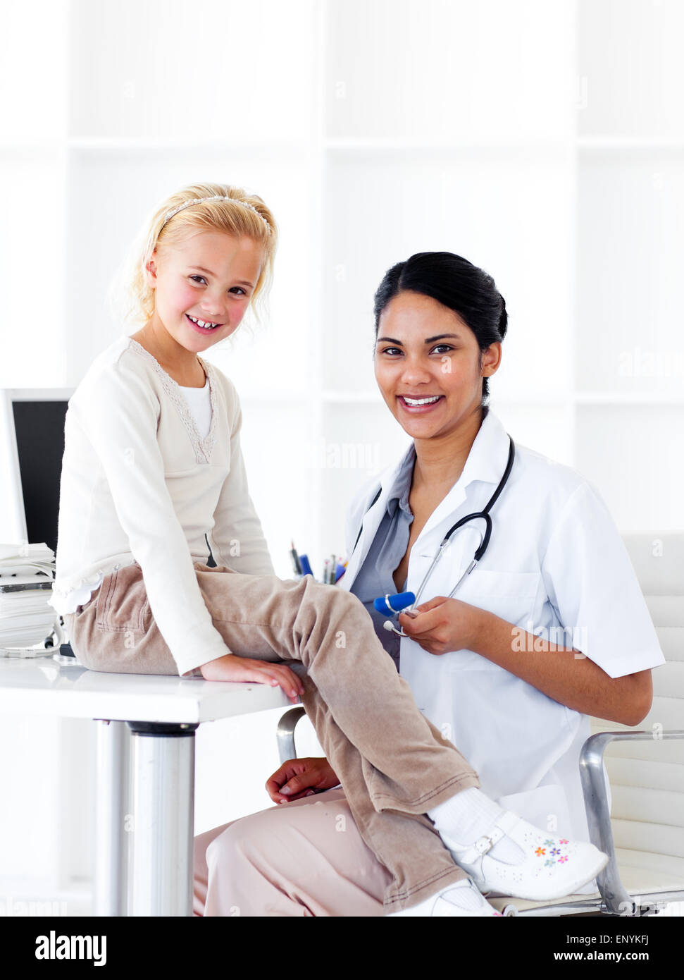 Adorable little girl attending a medical check-up Stock Photo - Alamy