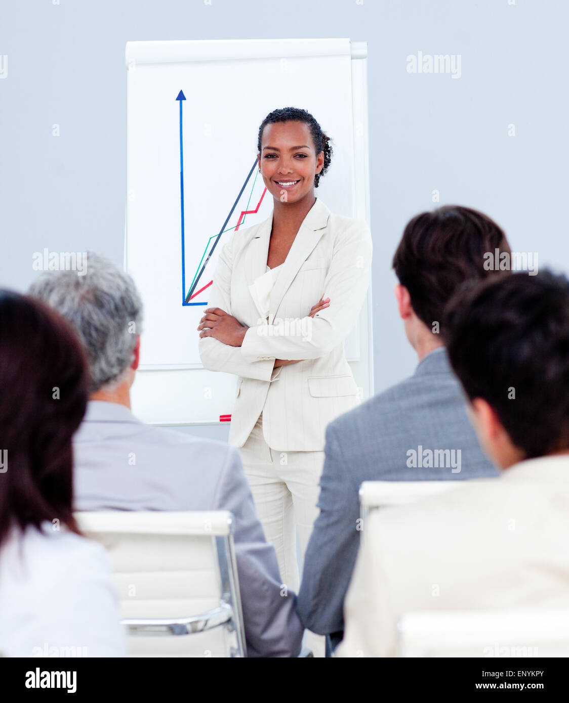 Attractive businesswoman doing a presentation Stock Photo - Alamy