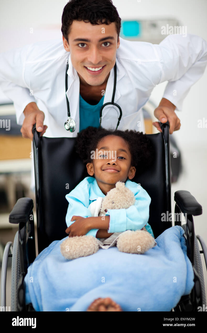 Young Doctor with a sick child Stock Photo - Alamy