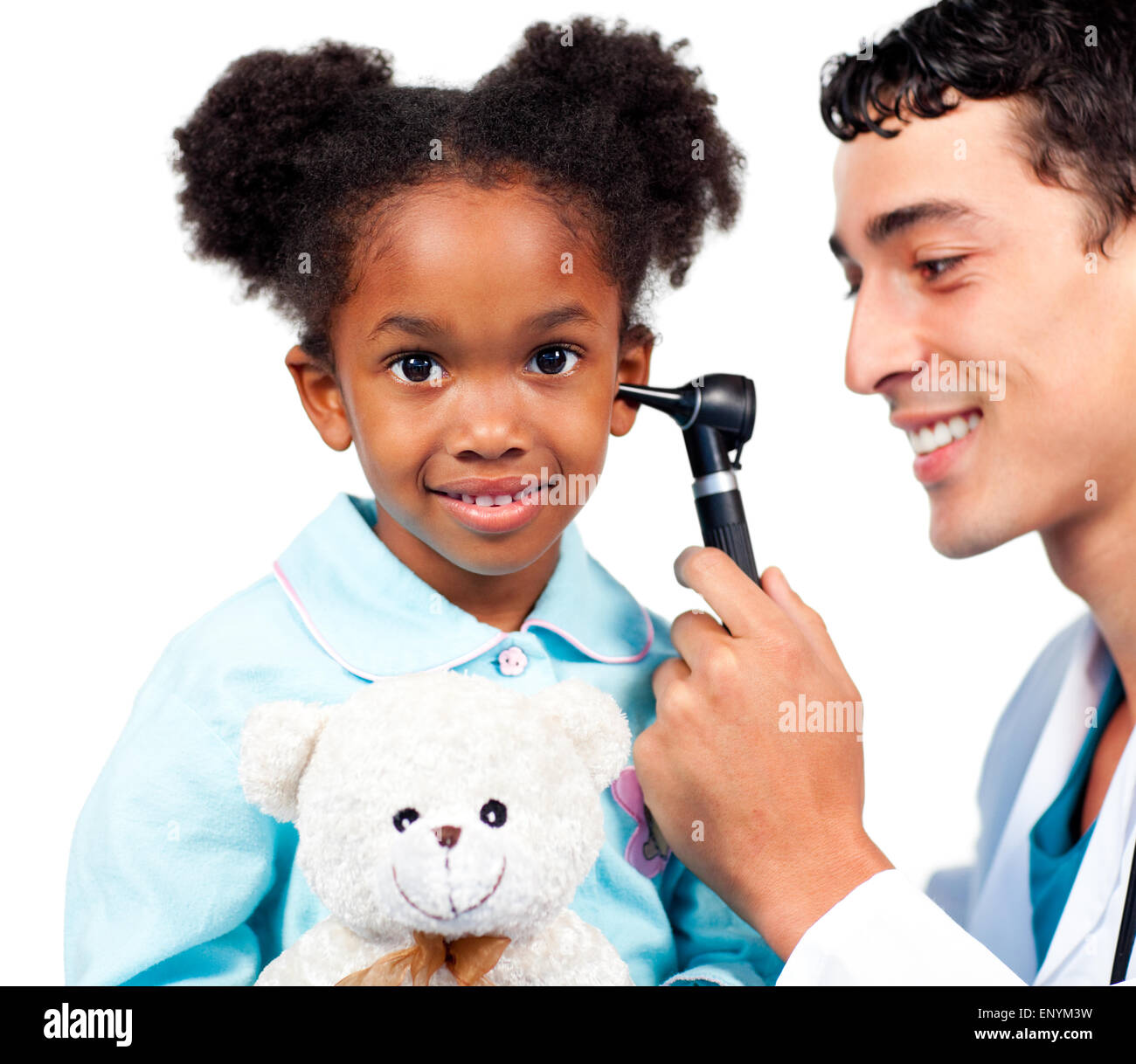 Smiling doctor examining his patient's ears against a white background ...