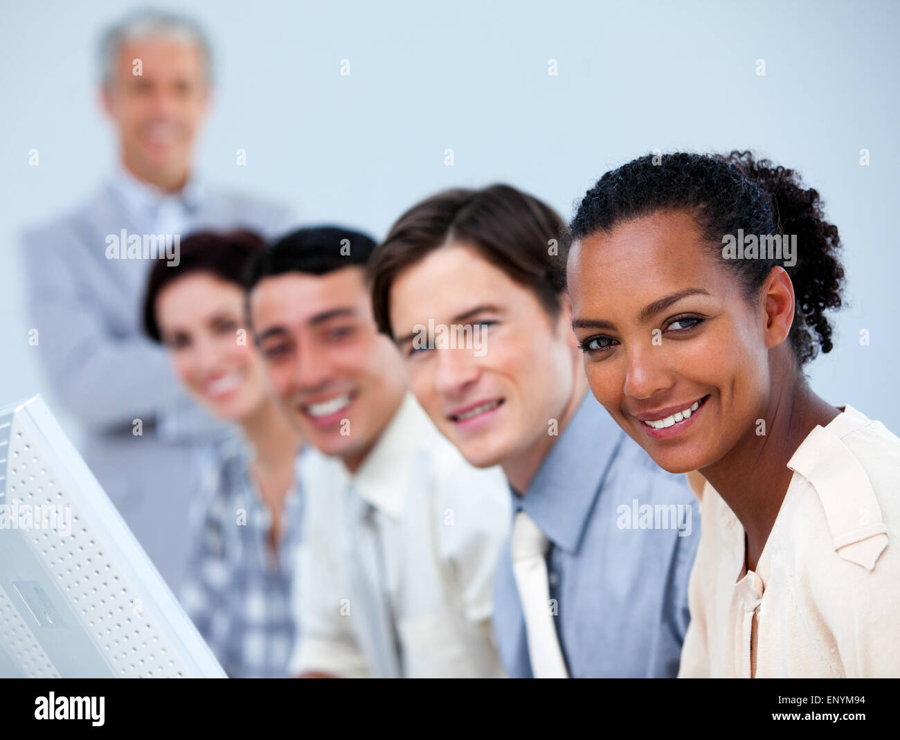 Young business partners with their senior manager Stock Photo - Alamy
