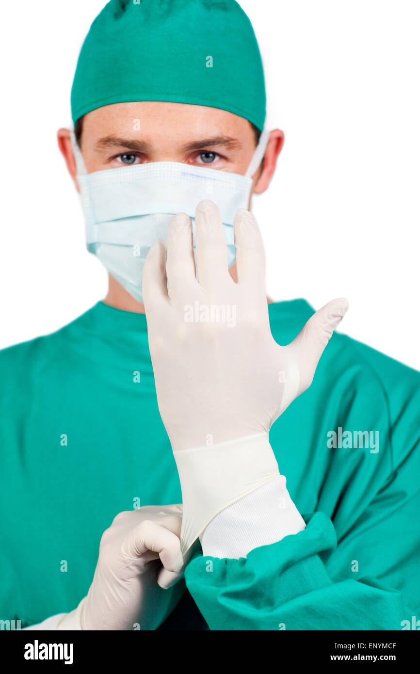 Surgeon adjusting his surgical gloves hi-res stock photography and ...
