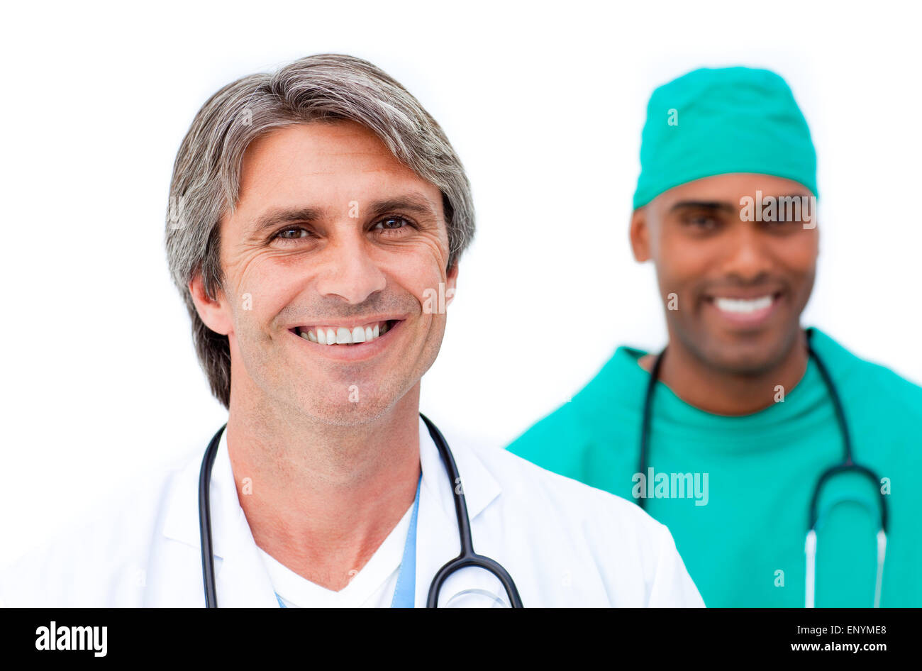 Smiling male doctors standing in a line Stock Photo - Alamy