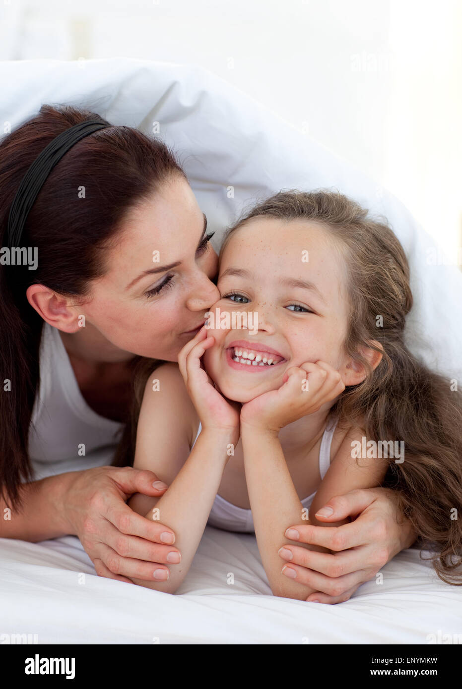 Mother kissing her daughter Stock Photo - Alamy Mother kissing her daughter Stock Photo - Alamy
