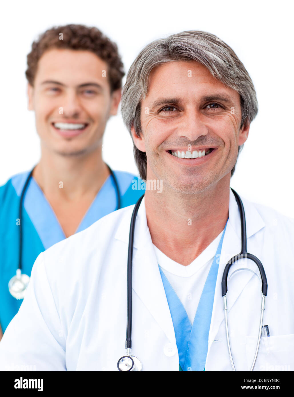 Cheerful male doctors smiling at the camera Stock Photo - Alamy