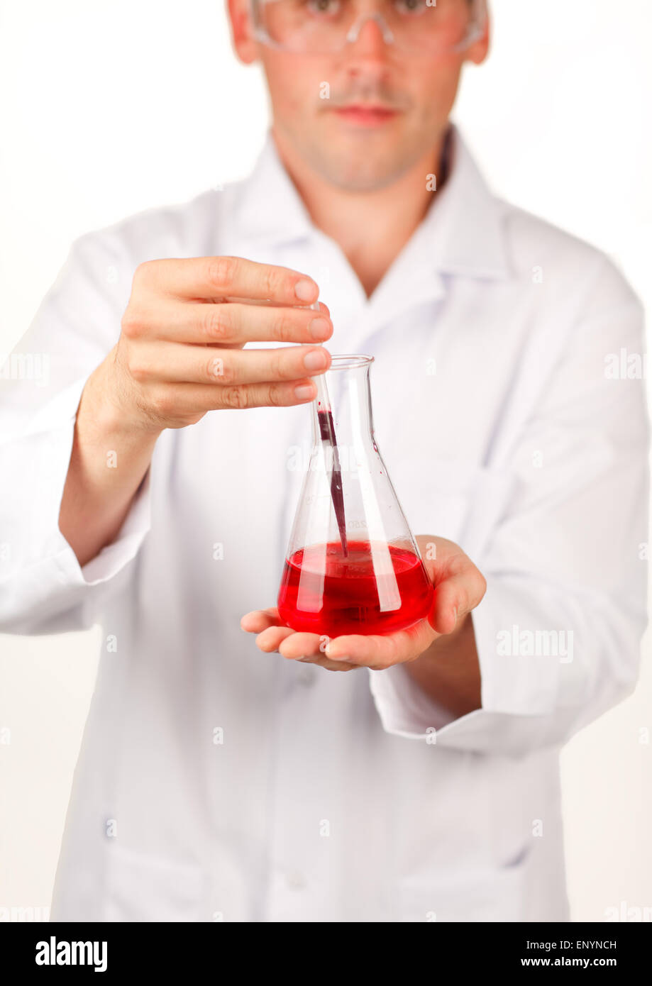 Young scientist holding a test-tube in a laboratory Stock Photo - Alamy