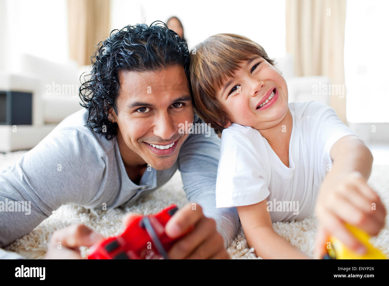 Animated little boy and his father playing video games Stock Photo - Alamy