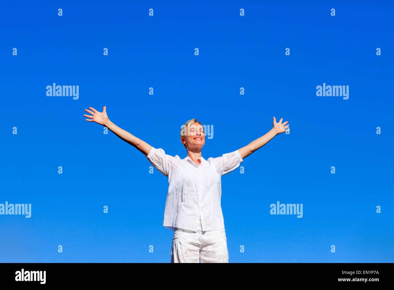 Attractive woman feeling free Stock Photo - Alamy