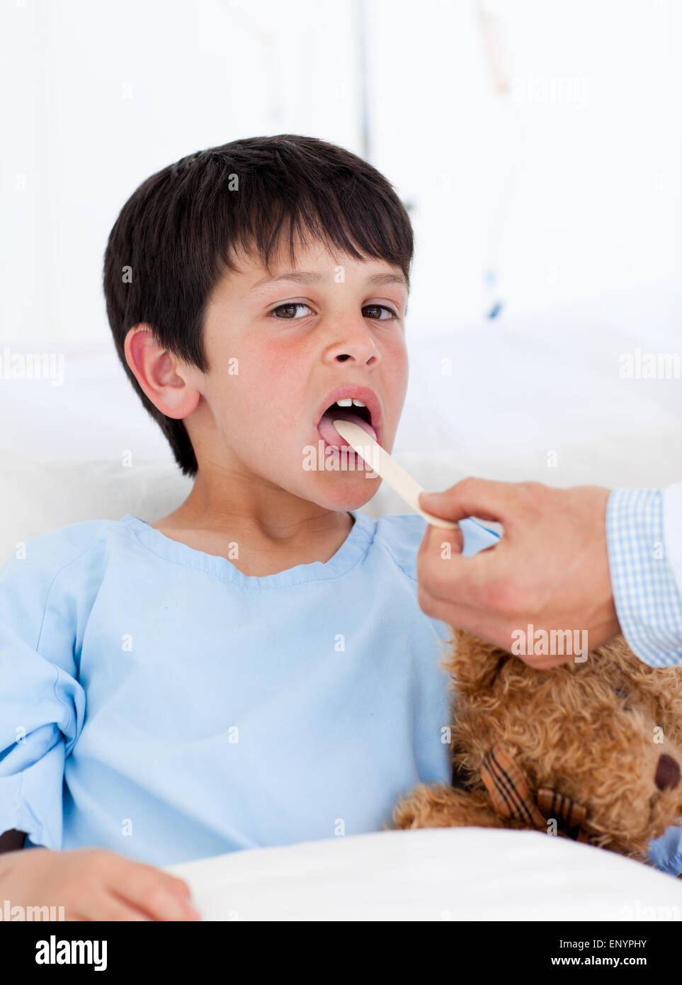 Adorable little boy attending medical exam Stock Photo - Alamy