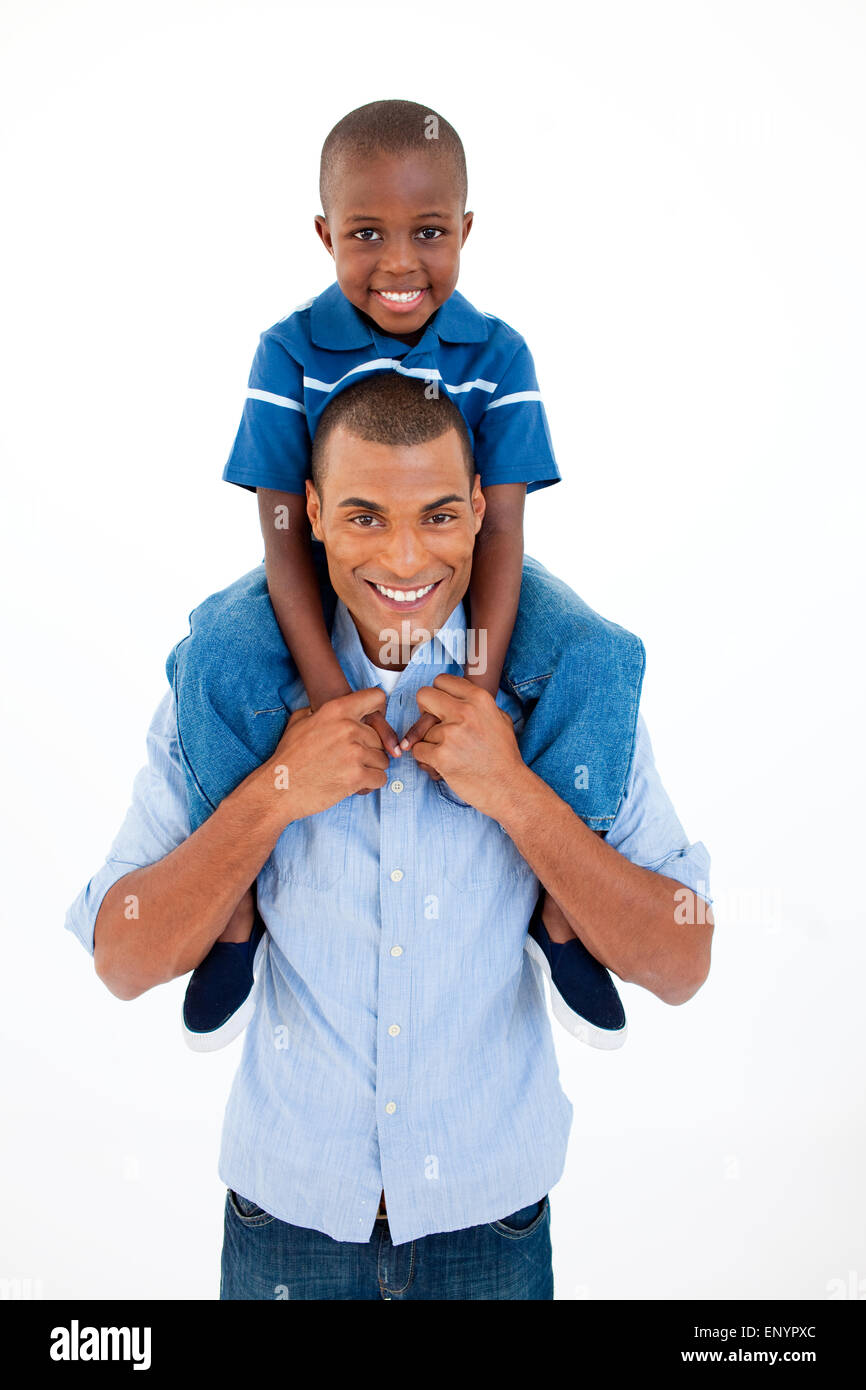 Close-up of a father giving son piggyback ride Stock Photo - Alamy