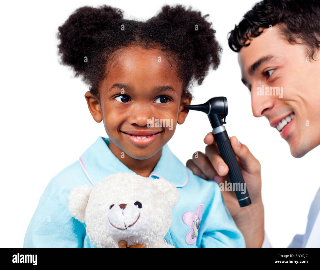 Adorable little girl attending medical check-up isolated on a white ...