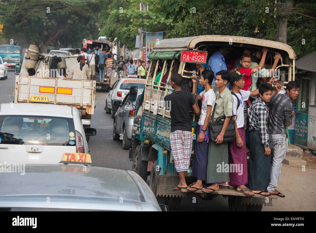 Myanmar (aka Burma), Yangon (aka Rangoon). Typical street scene with ...