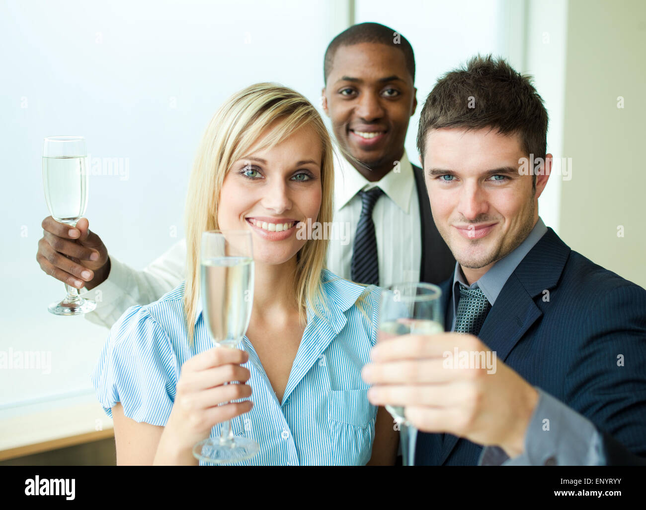 Cheerful diverse colleagues in party hi-res stock photography and ...