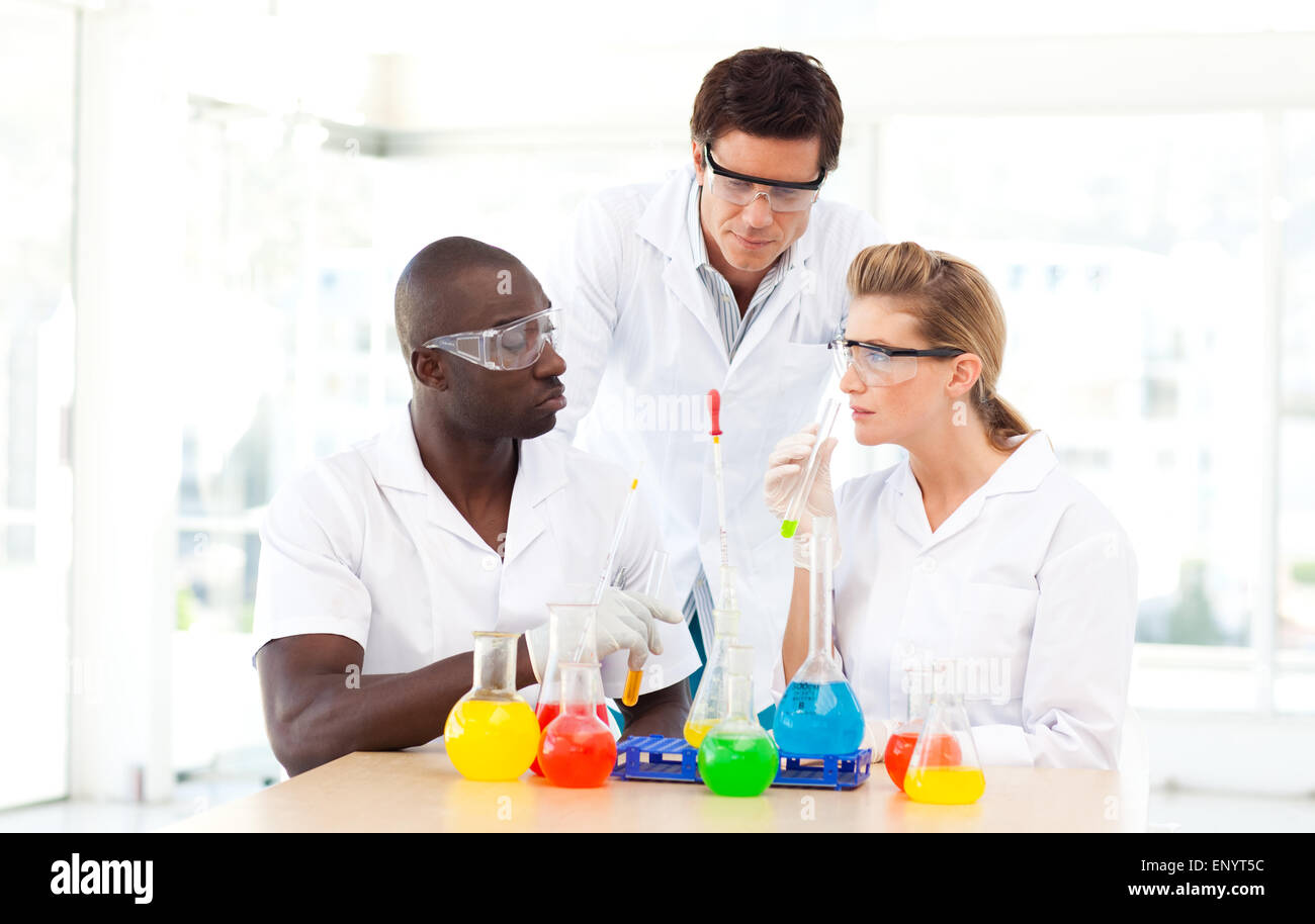 Young scientists discussing in a laboratory Stock Photo - Alamy