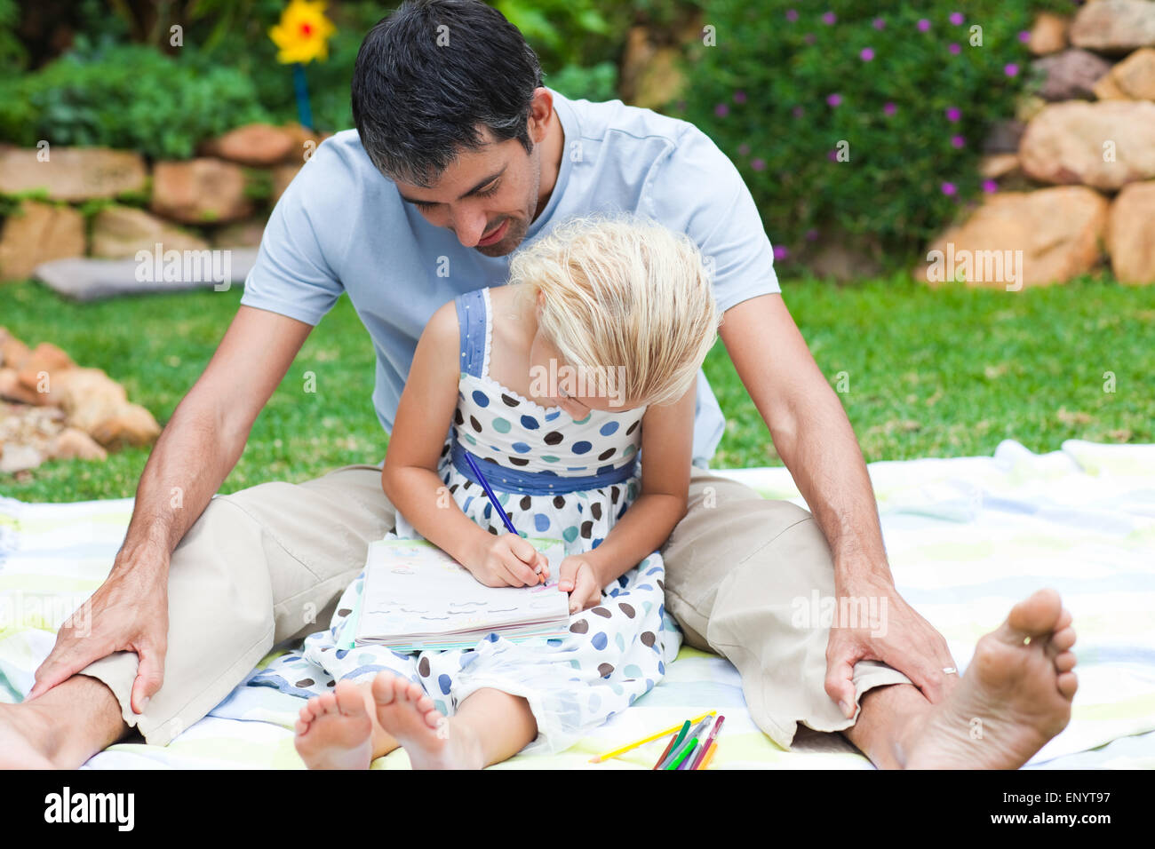 Father and daughter writing Stock Photo - Alamy