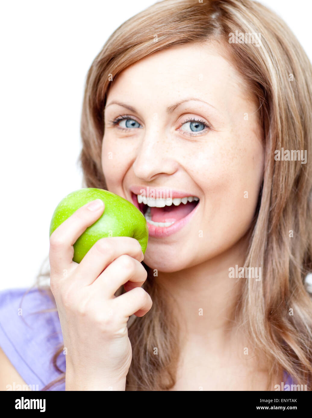 Beautiful woman holding an apple Stock Photo - Alamy