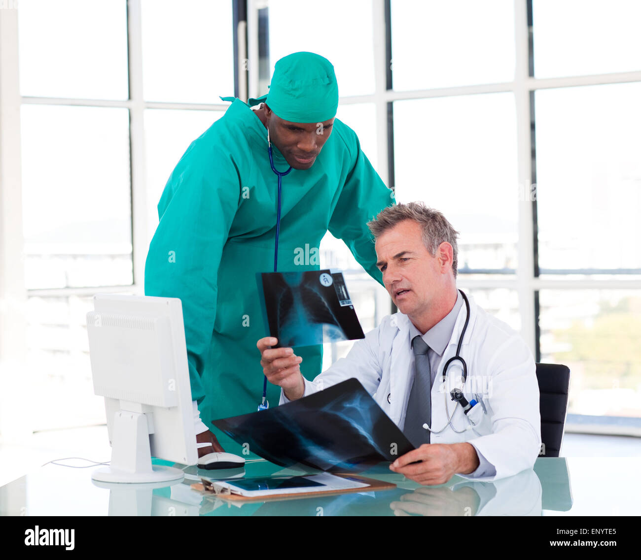 African american doctors talking together hi-res stock photography and ...