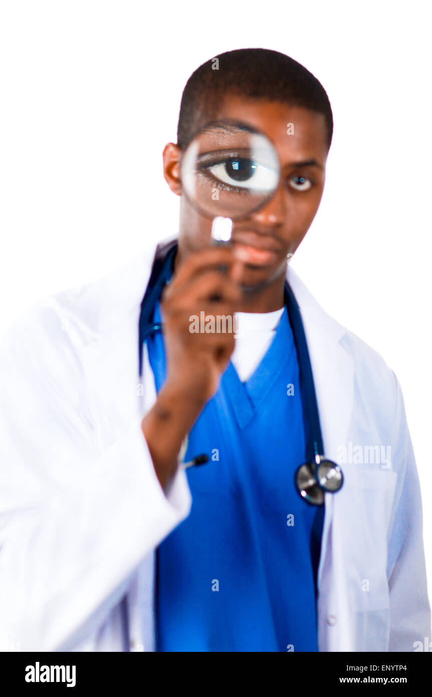 Young doctor looking through a magnifying glass Stock Photo - Alamy
