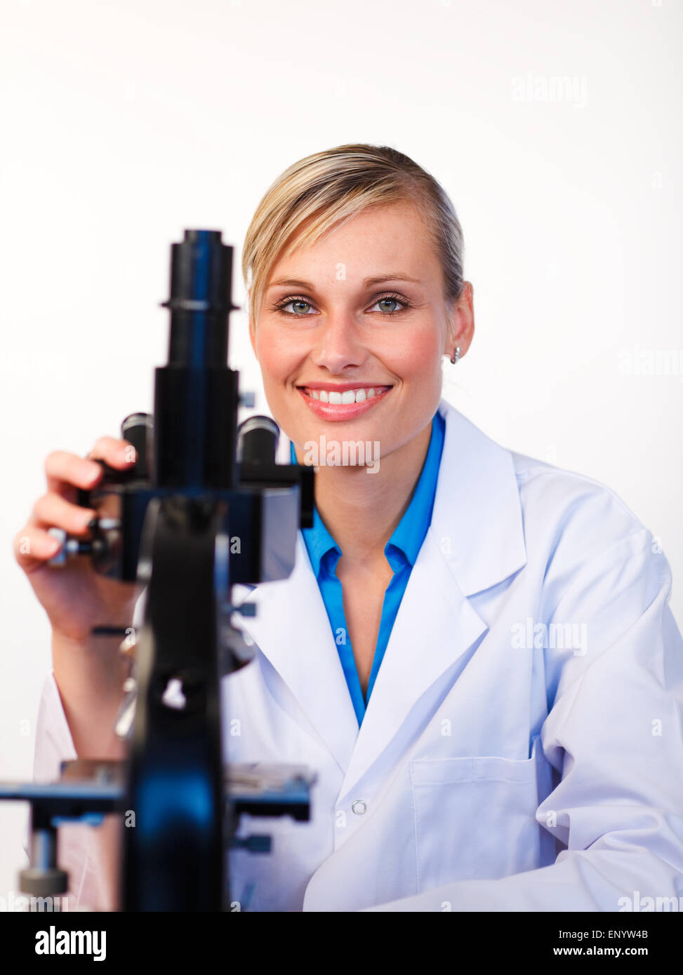Beautiful scientist with a microscope Stock Photo - Alamy