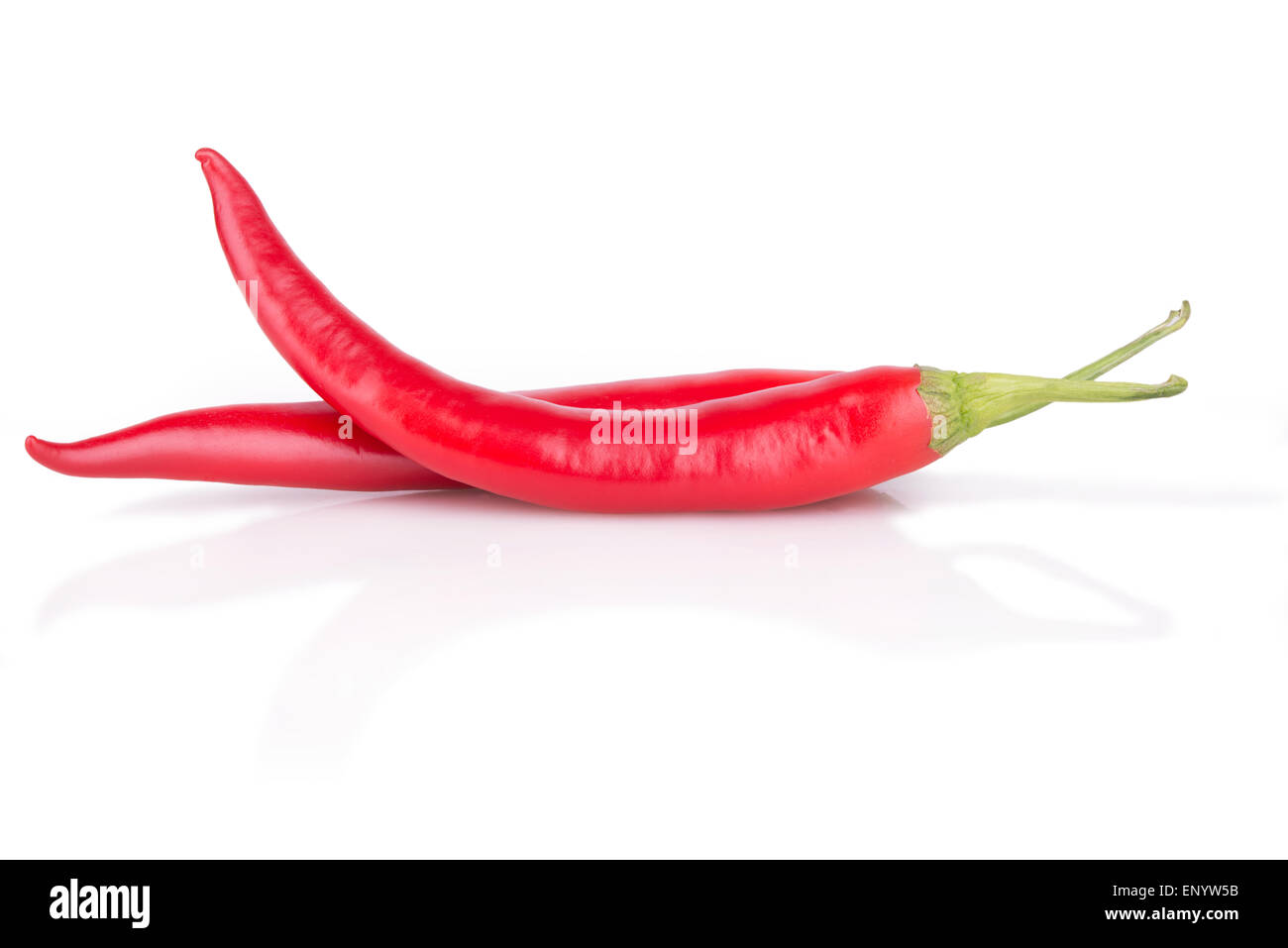 two red chili pepper on a white background Stock Photo - Alamy