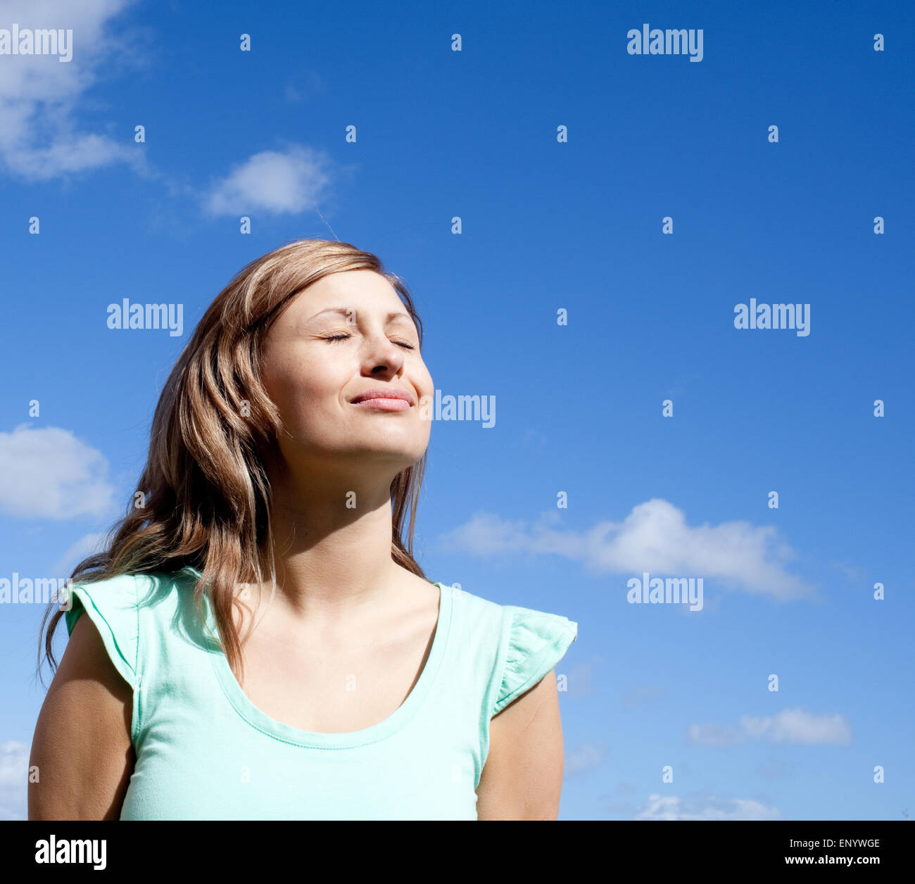 Portrait of a delighted woman relaxing outdoor Stock Photo - Alamy