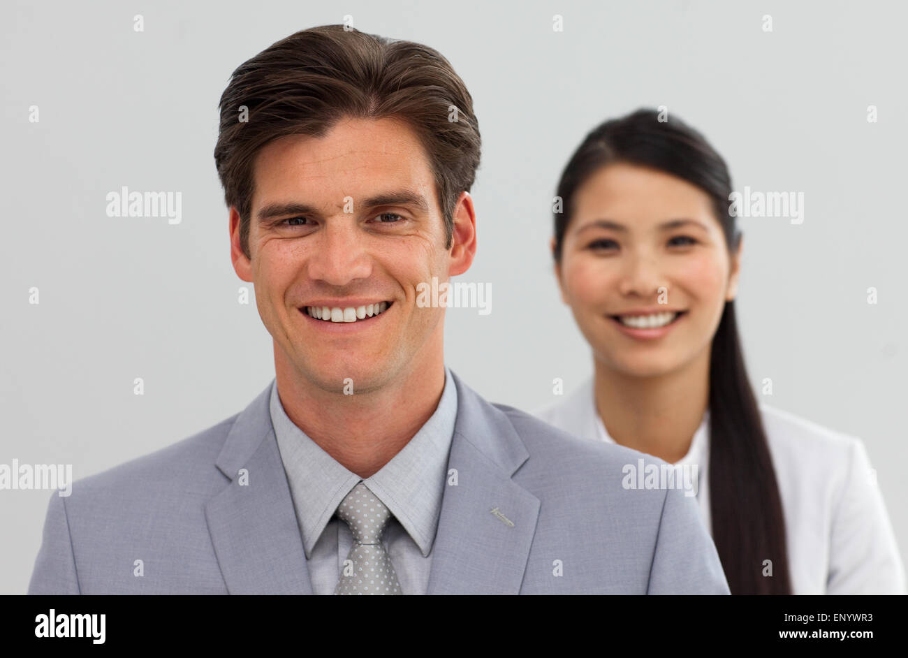 Multi-ethnic Business co-workers standing in a line Stock Photo - Alamy