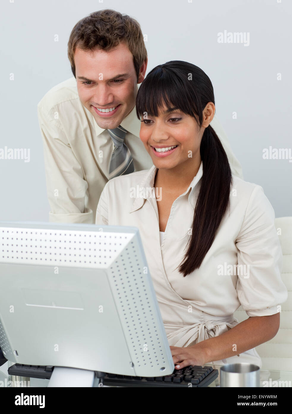 Attractive business people in the office Stock Photo - Alamy