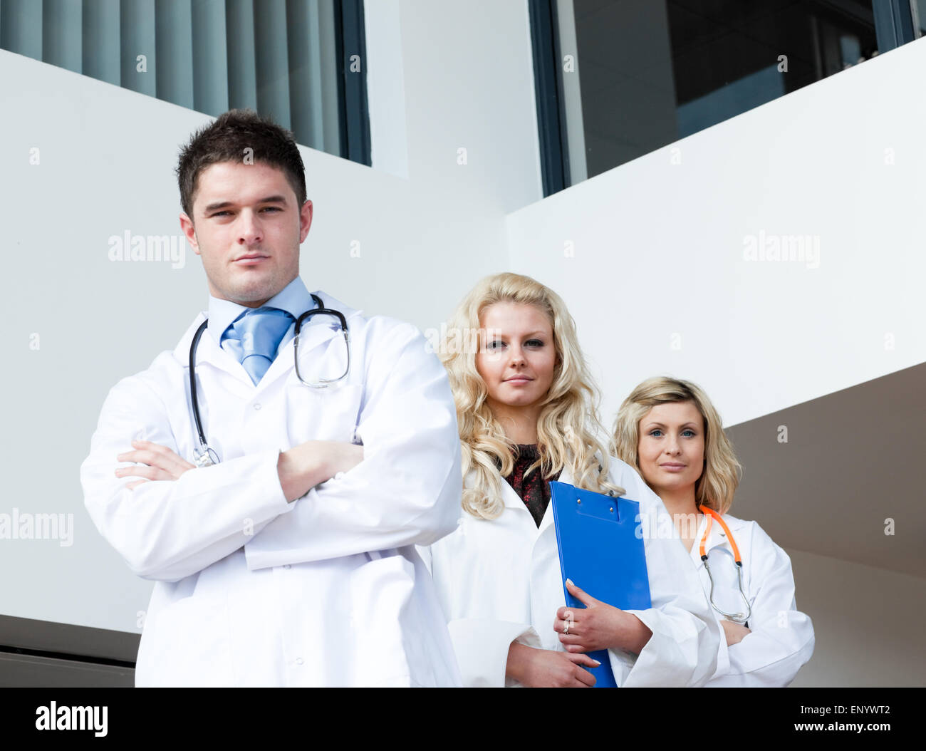 Three doctors in a hospital Stock Photo - Alamy